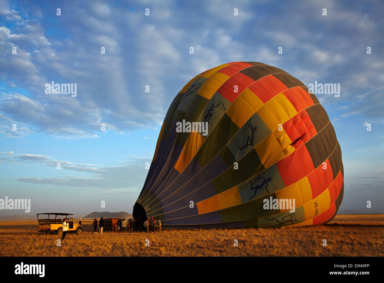 Launching hot air balloon in early light, Namib Desert, near Sesriem ...