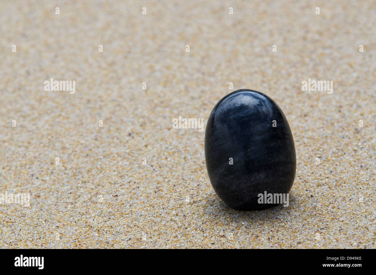 polished stones of different colors at the beach Stock Photo - Alamy
