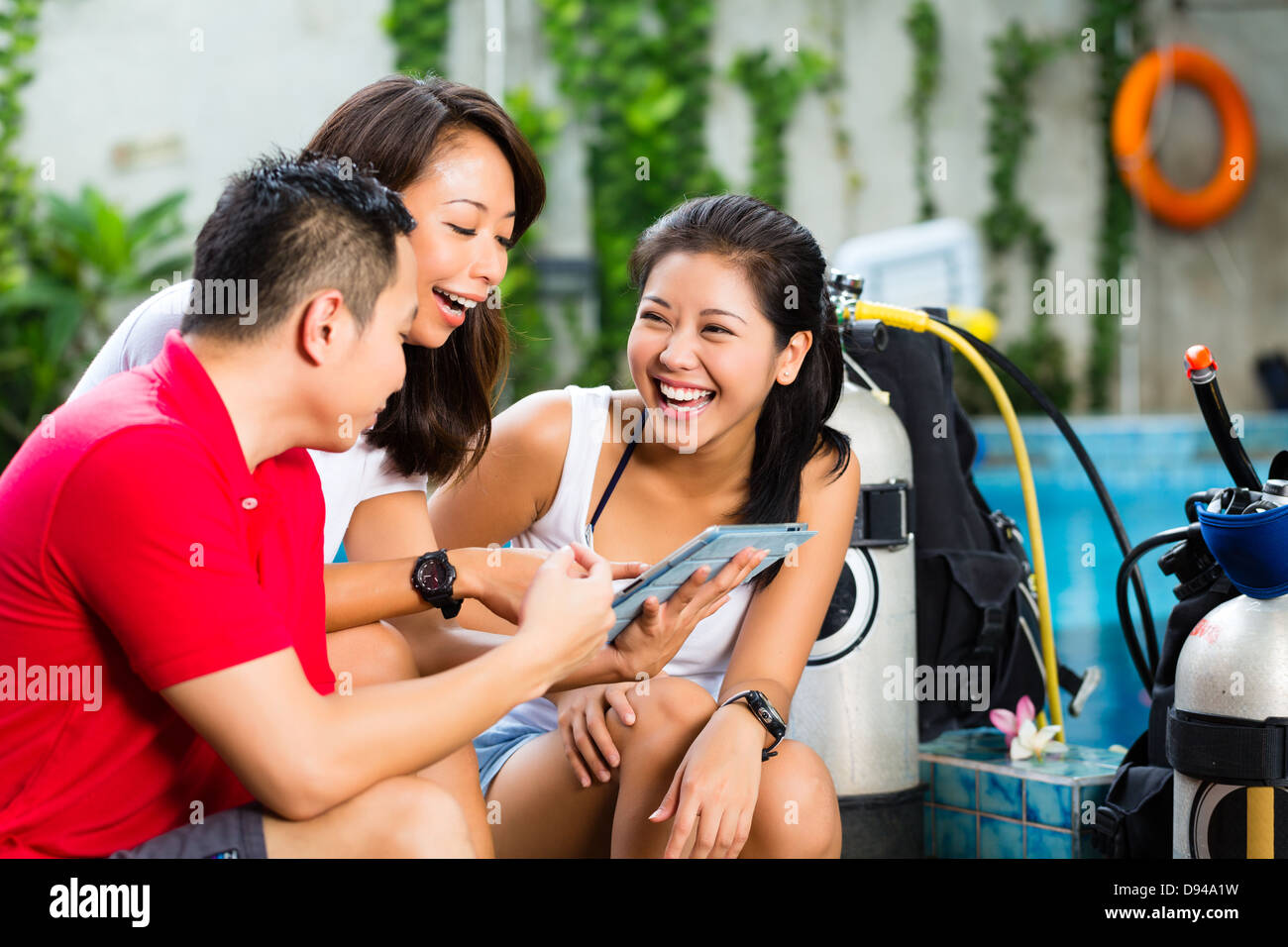 Asian people, divemaster and students at the diver Course on holiday ...