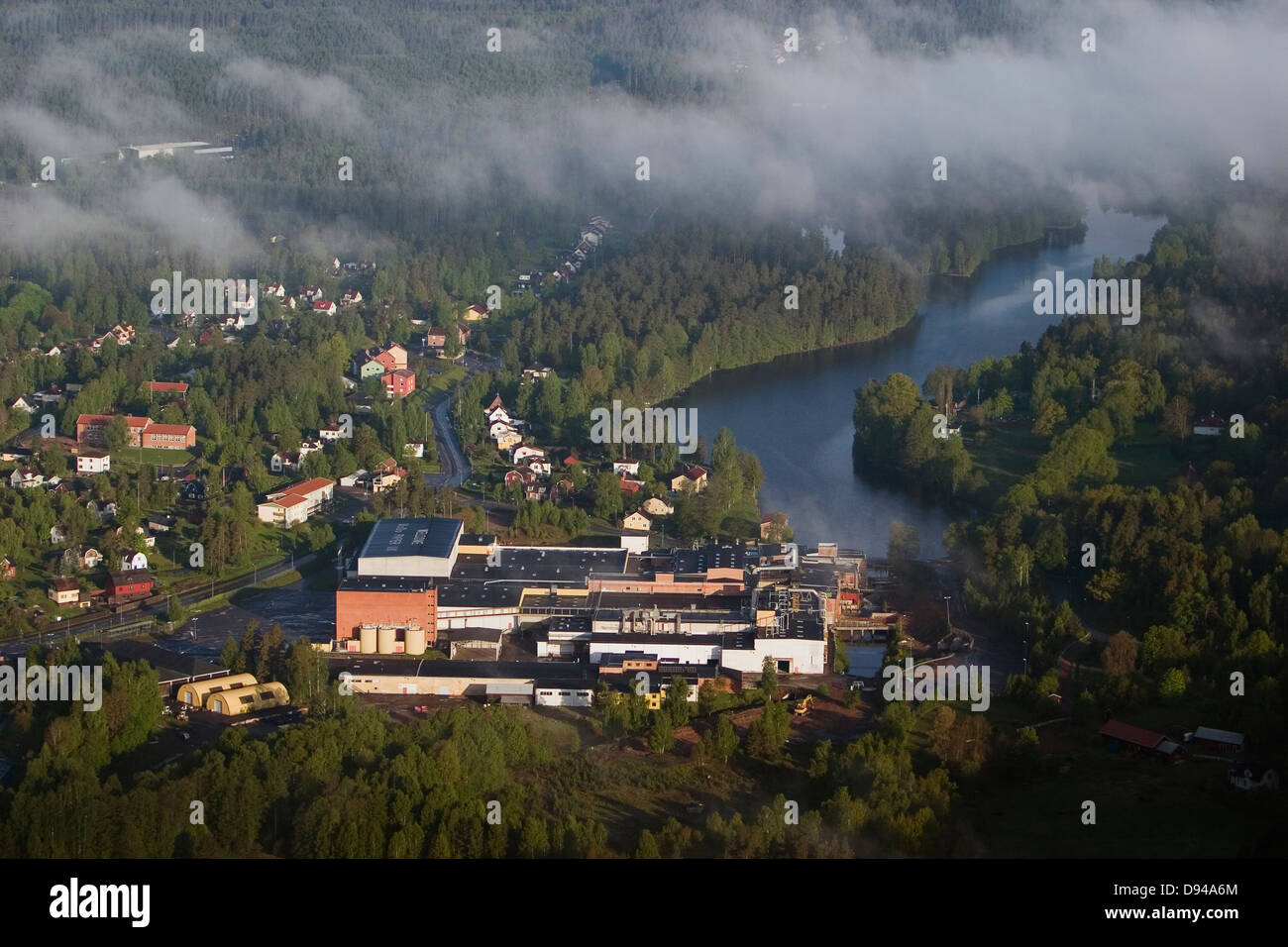 A town and forest in morning fog, Hogsby, Smaland, Sweden Stock Photo ...