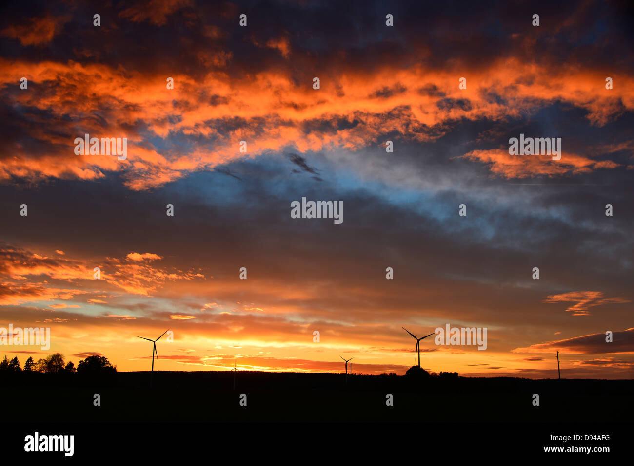 Wind turbines at sunset Stock Photo - Alamy