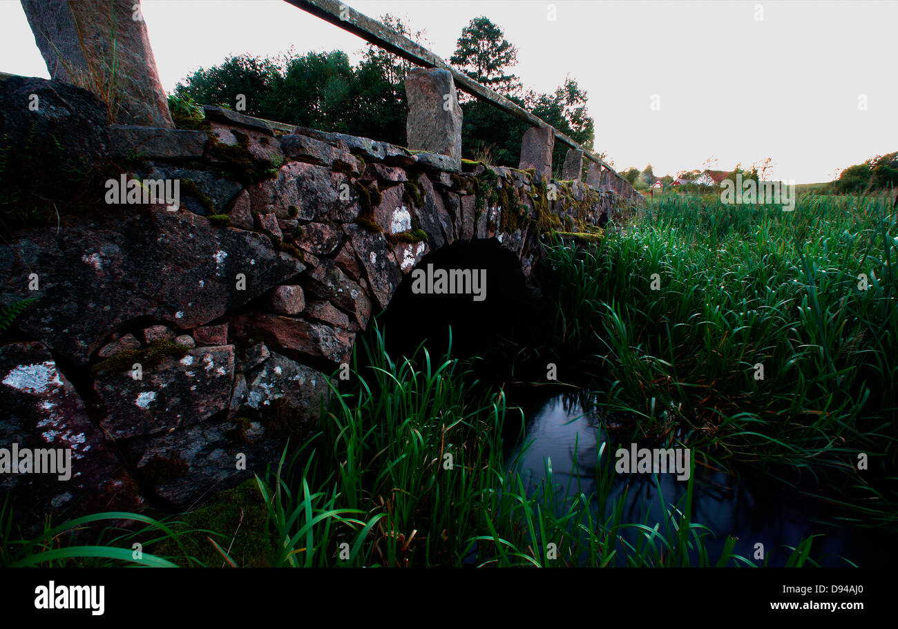Old stone footbridge Stock Photo - Alamy