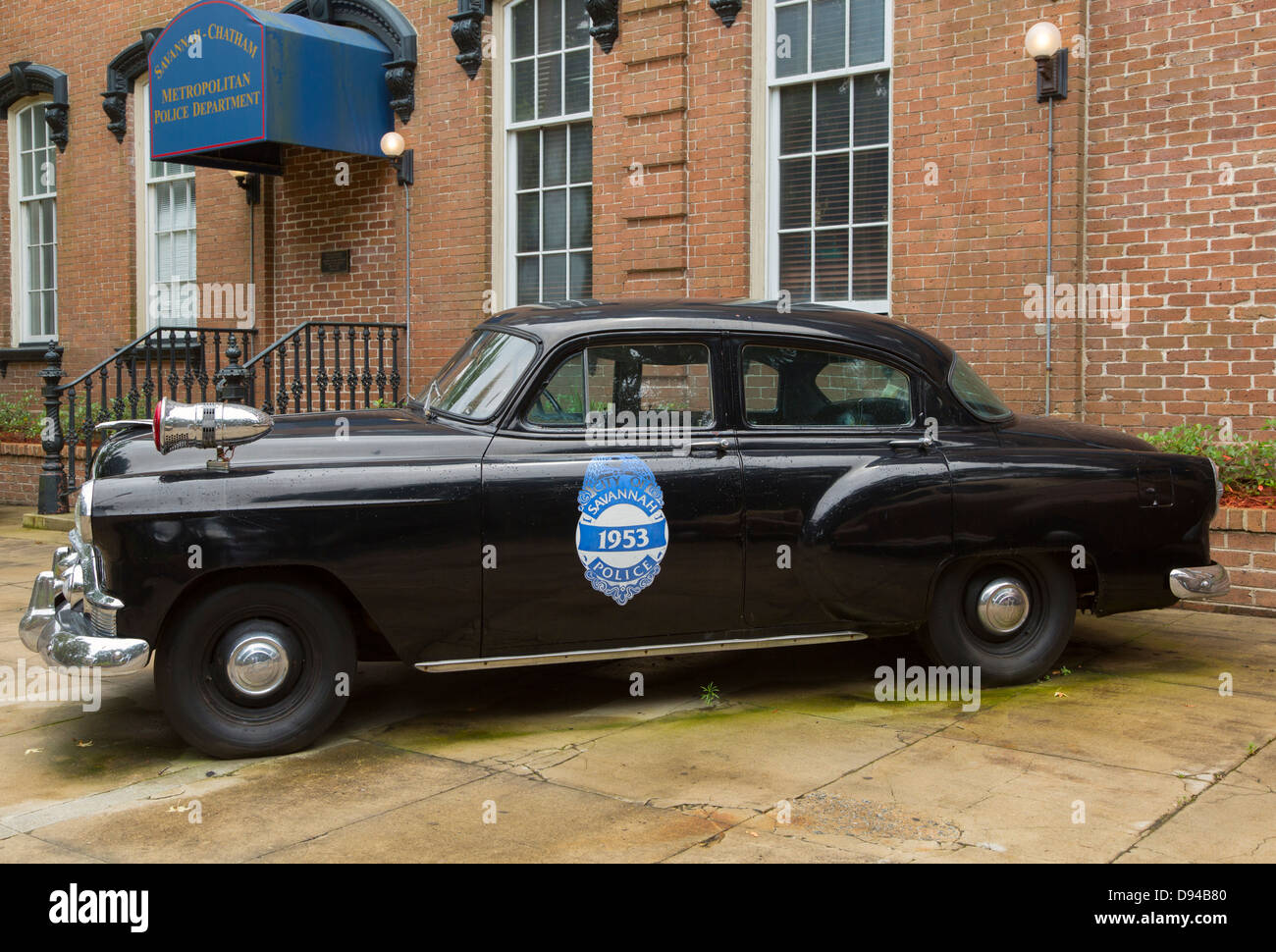 Vintage police patrol cars on display outside the historic Savannah ...