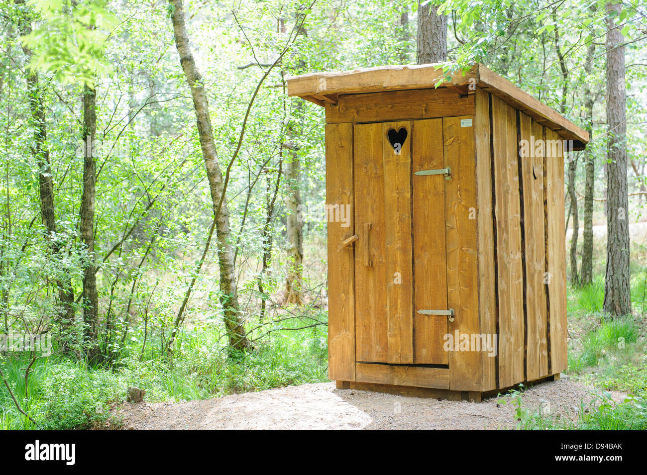 Outhouse in forest Stock Photo - Alamy