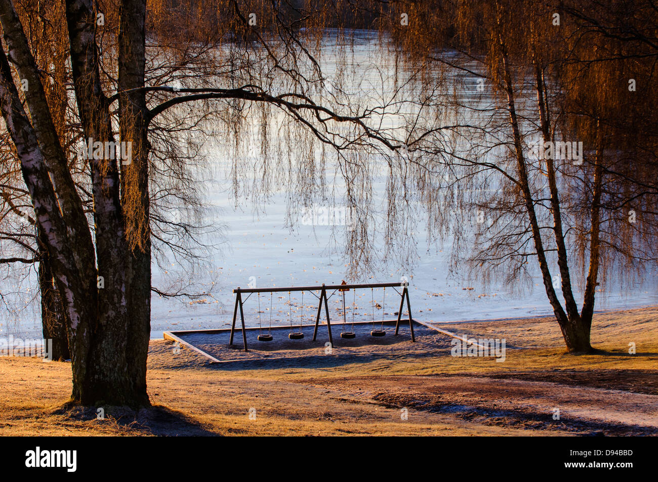 Playground on edge of lake Stock Photo - Alamy
