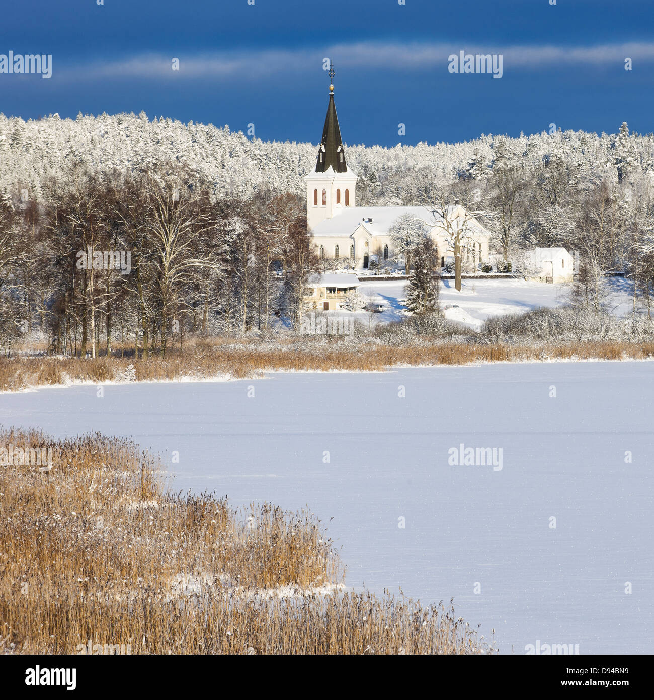 Winter landscape with church Stock Photo - Alamy