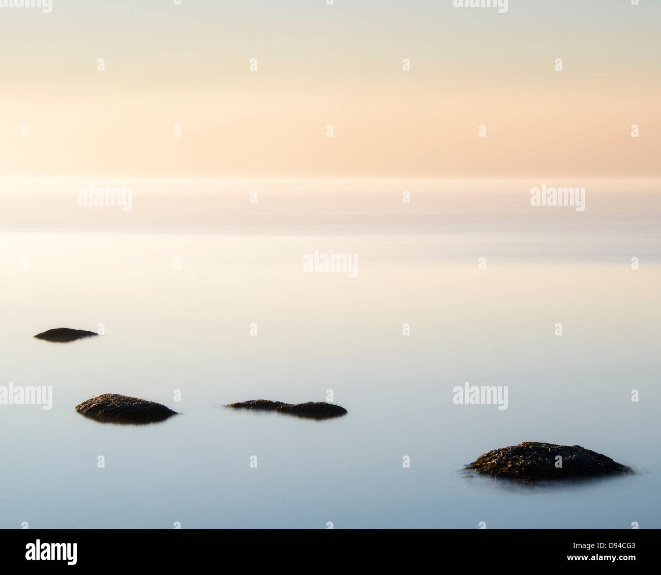 Rocks in water Stock Photo - Alamy