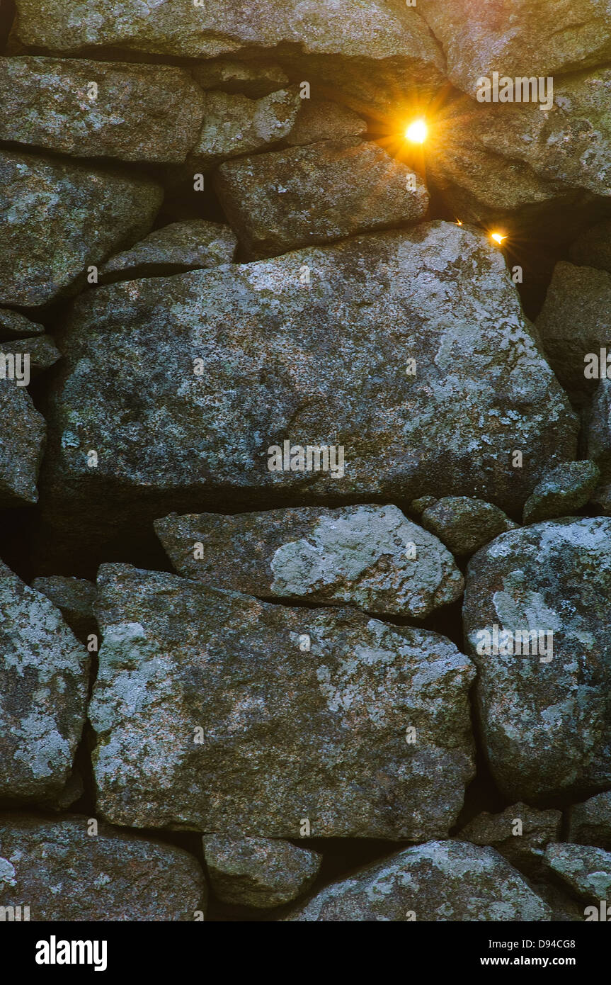 Stone wall with solar flare Stock Photo - Alamy