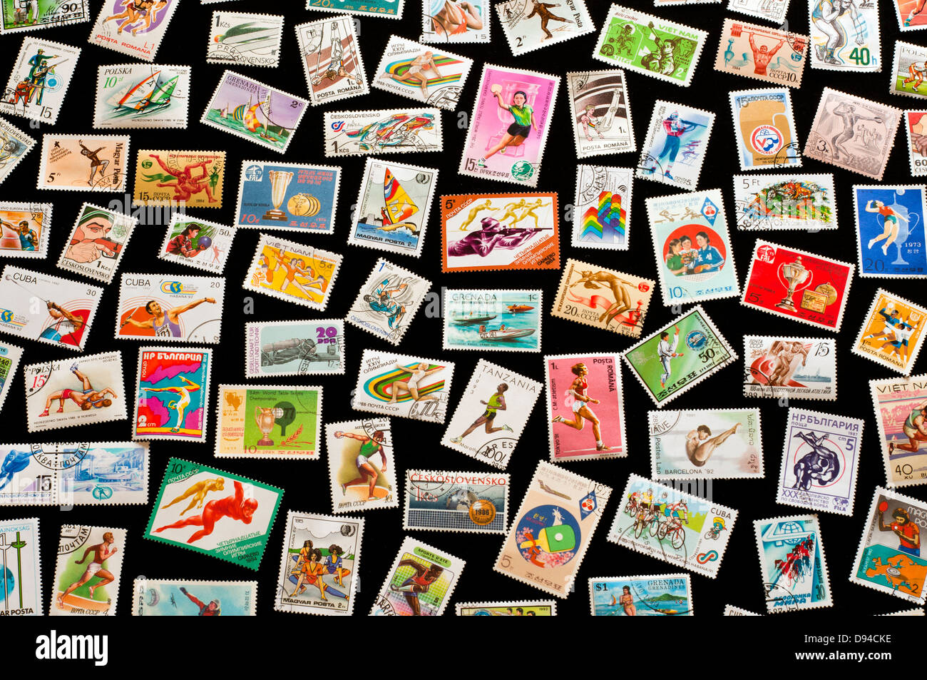 mixed sport postage stamps in studio setting Stock Photo - Alamy