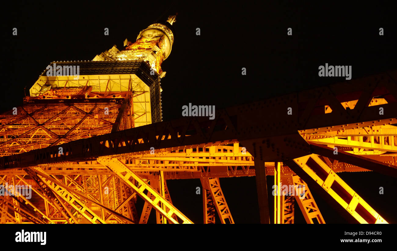 Tokyo Tower at Night in orange glow taken from bottom up showing its ...