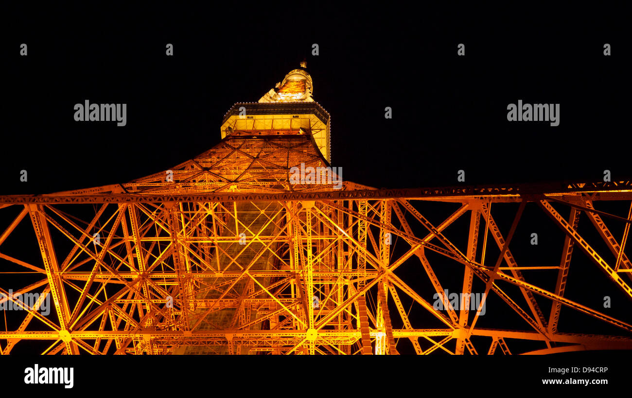 Tokyo Tower at Night in orange glow taken from bottom up showing its ...