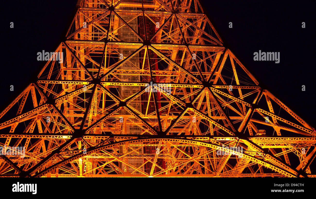 Tokyo Tower at Night in orange glow taken from bottom up showing its ...