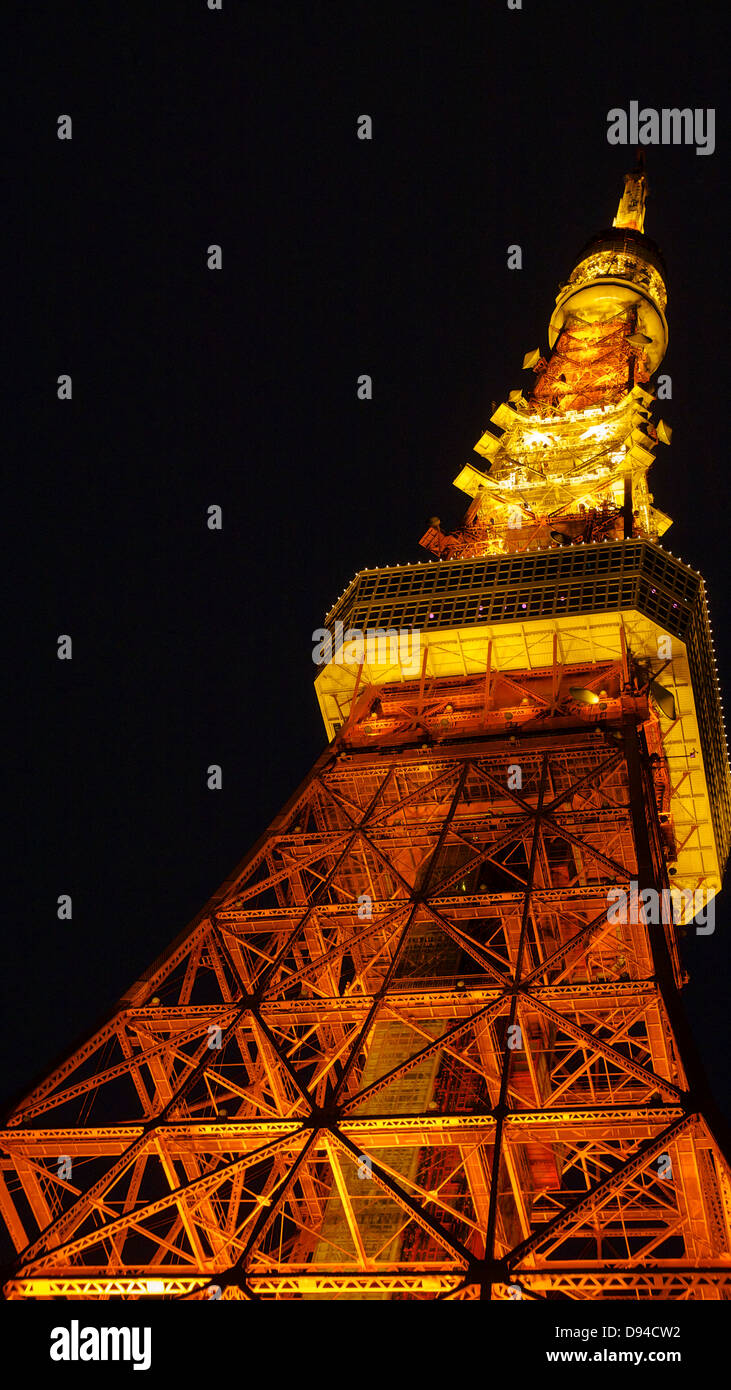 Tokyo Tower at Night in orange glow taken from bottom up showing its ...