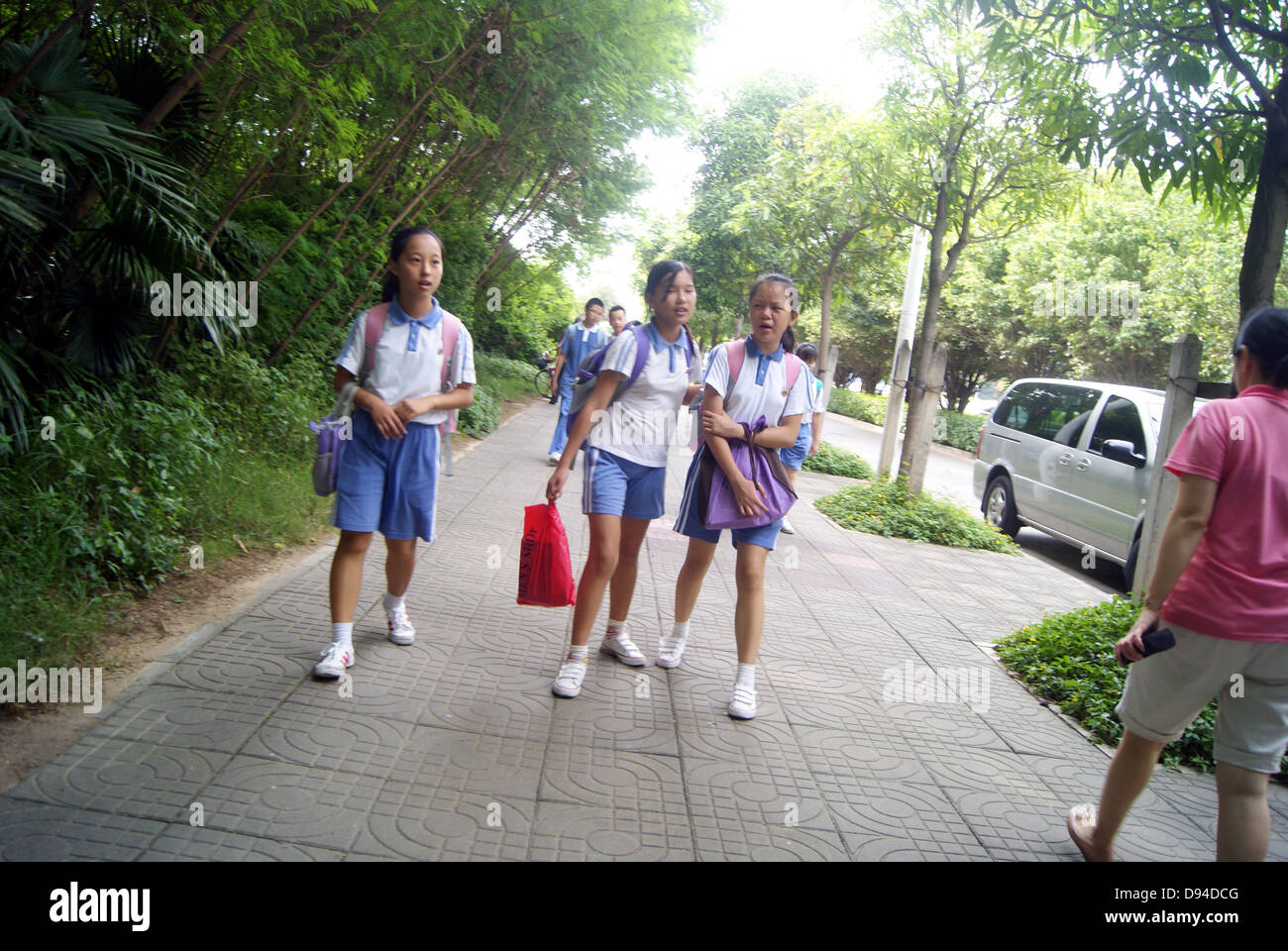 Students come home from school, in shenzhen, China Stock Photo - Alamy