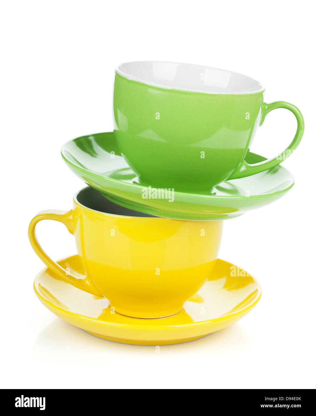 Two colorful cups. Isolated on white background Stock Photo - Alamy