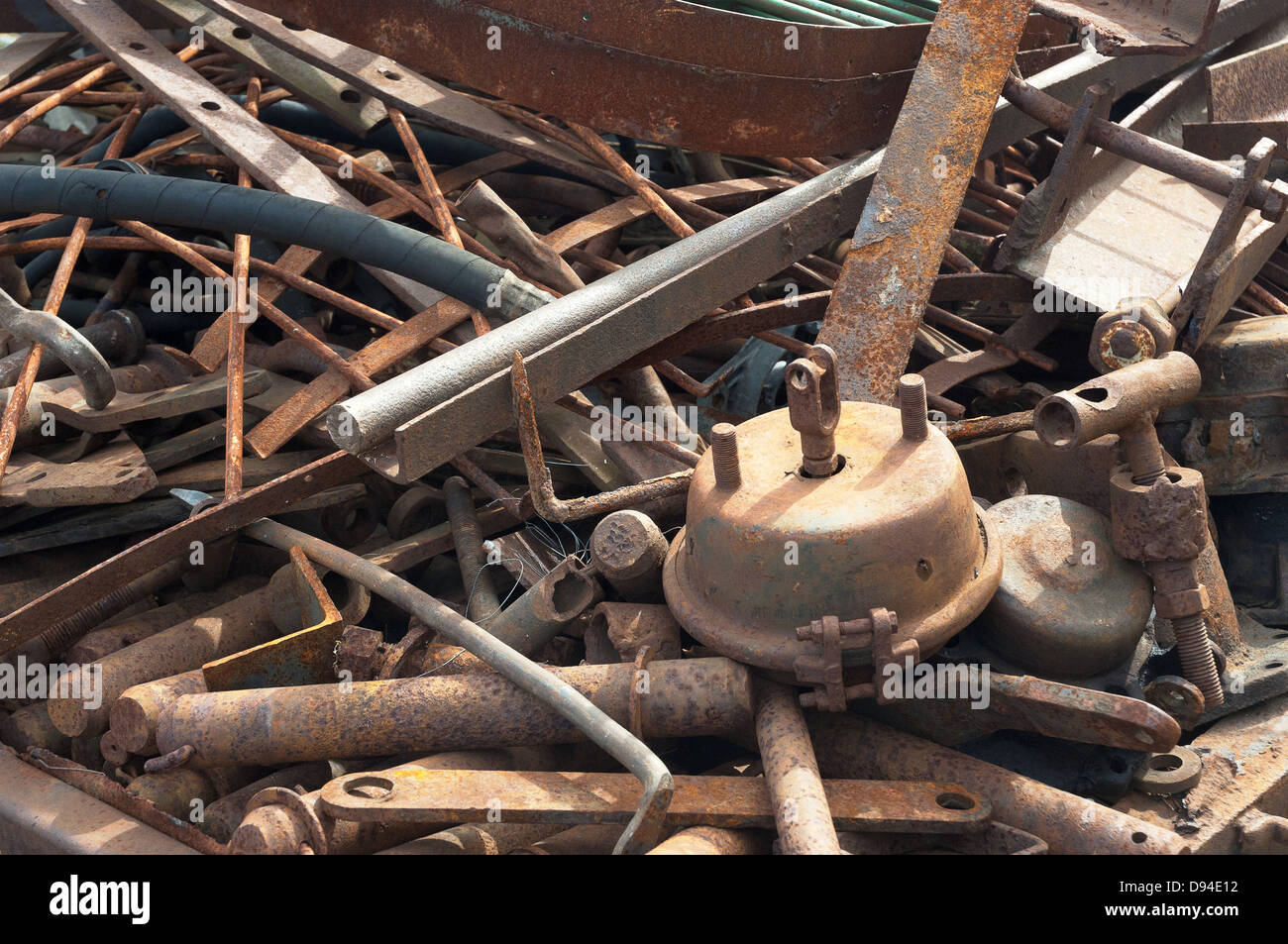 Rusty industrial details on metal collector of garbage Stock Photo - Alamy