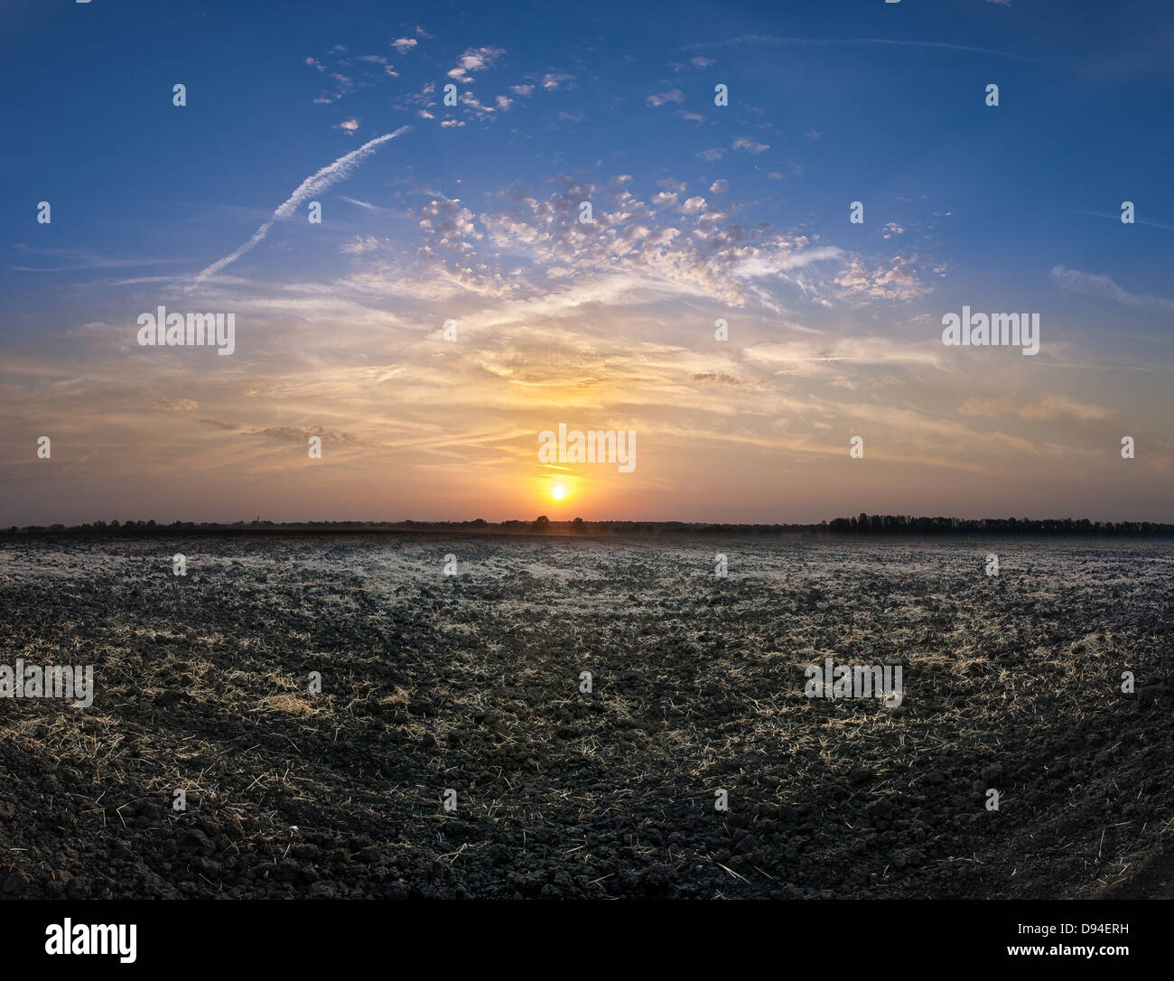 a sunrise over fields Stock Photo - Alamy