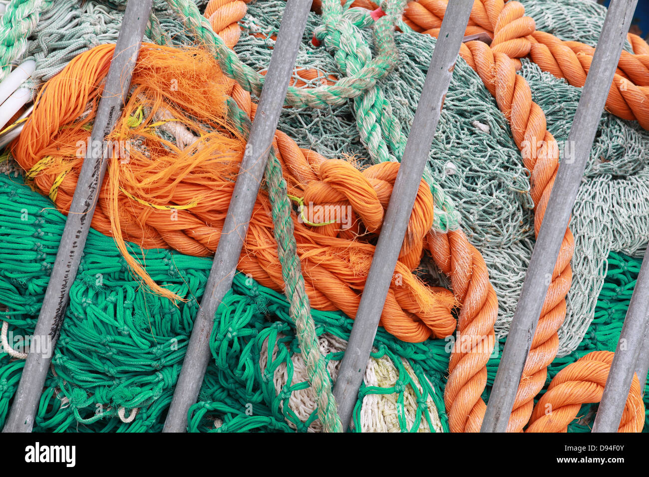 Heap of fishing net and naval ropes Stock Photo - Alamy