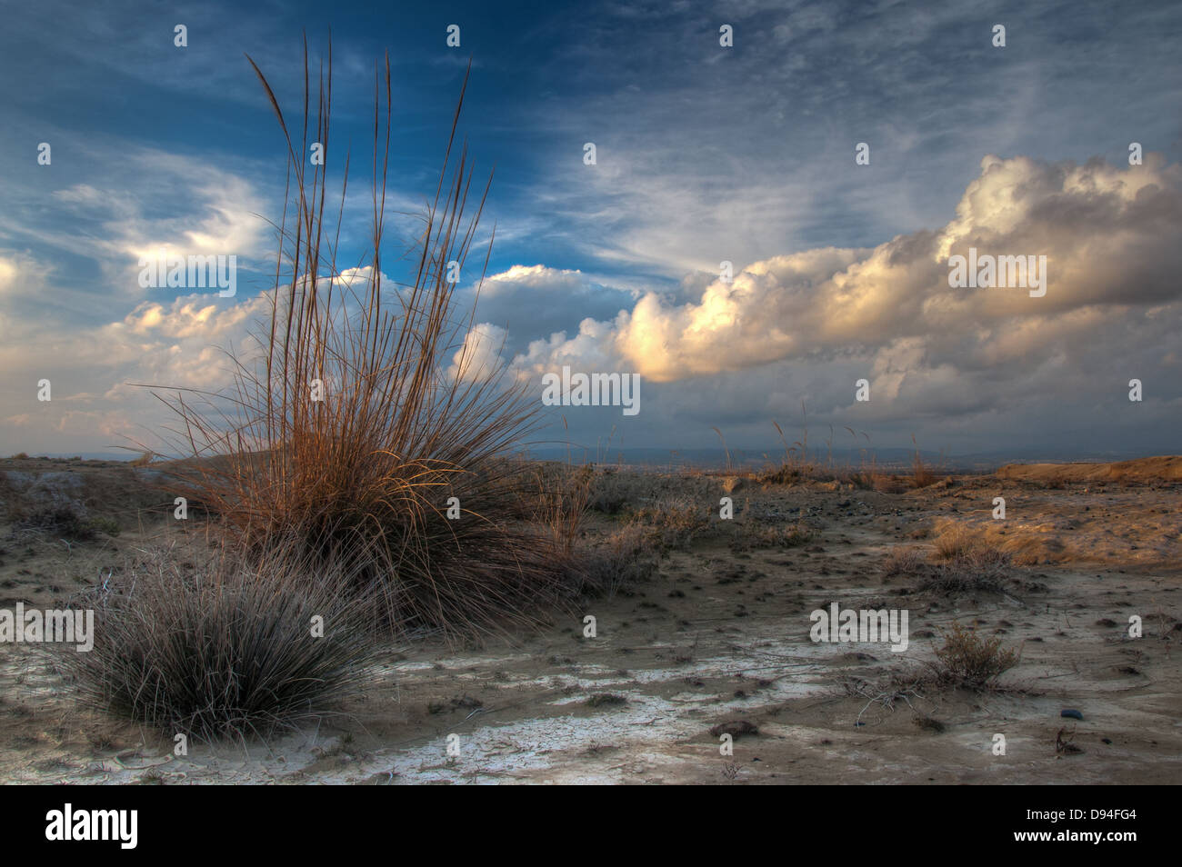 clouds over fields of cyprus Stock Photo - Alamy