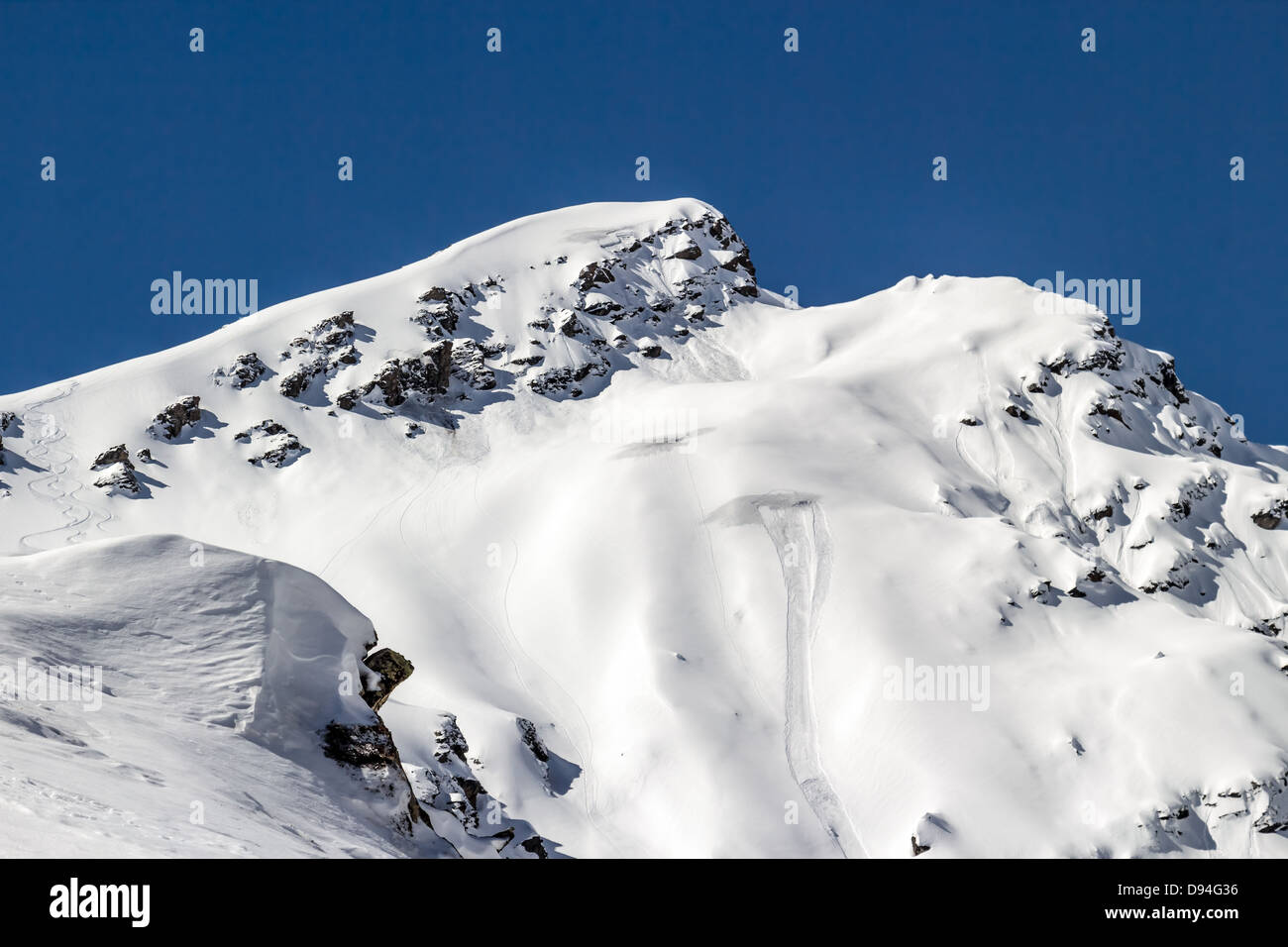 Snow landslides. Birth of avalanches in the mountains. Dark spots from ...