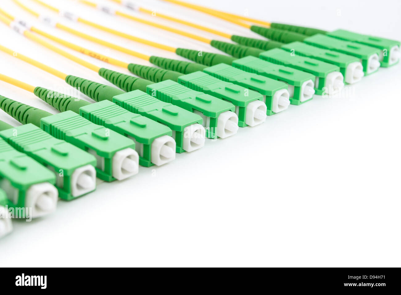 green fiber optic SC connectors on white background Stock Photo - Alamy