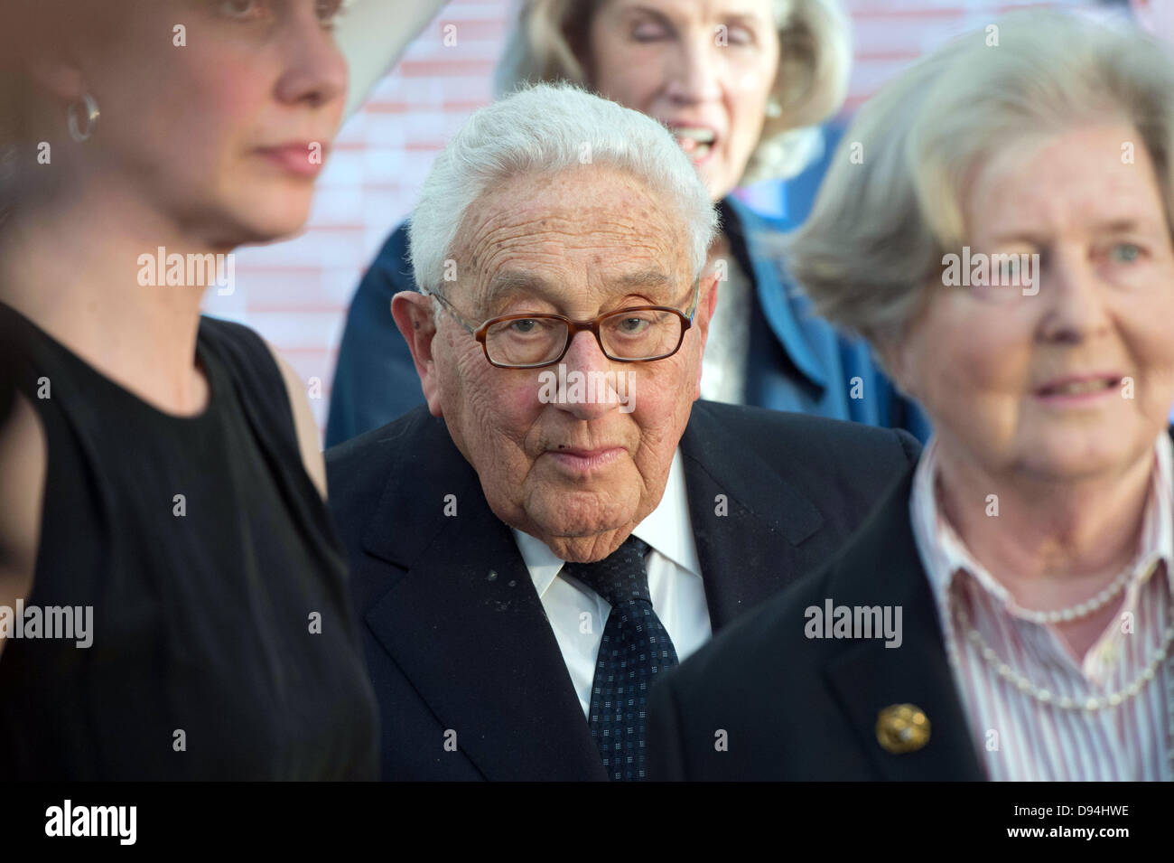 Former US Secretary of State Henry Kissinger (C) arrives with Marianne ...