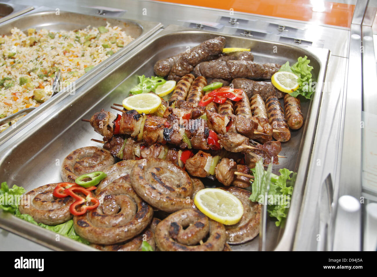 Tray full of food grill Stock Photo - Alamy