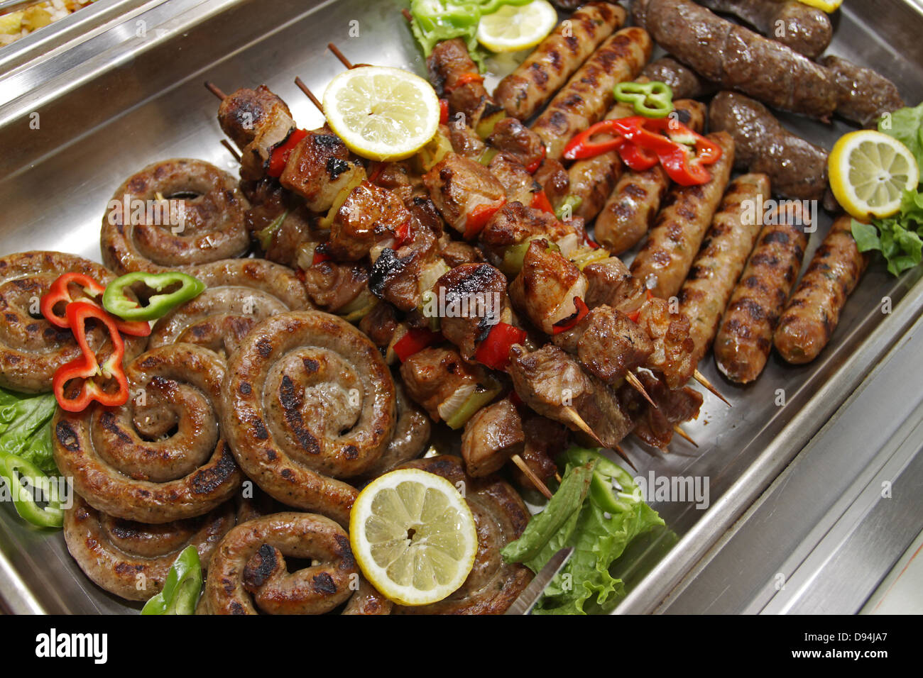 Tray full of food grill Stock Photo - Alamy