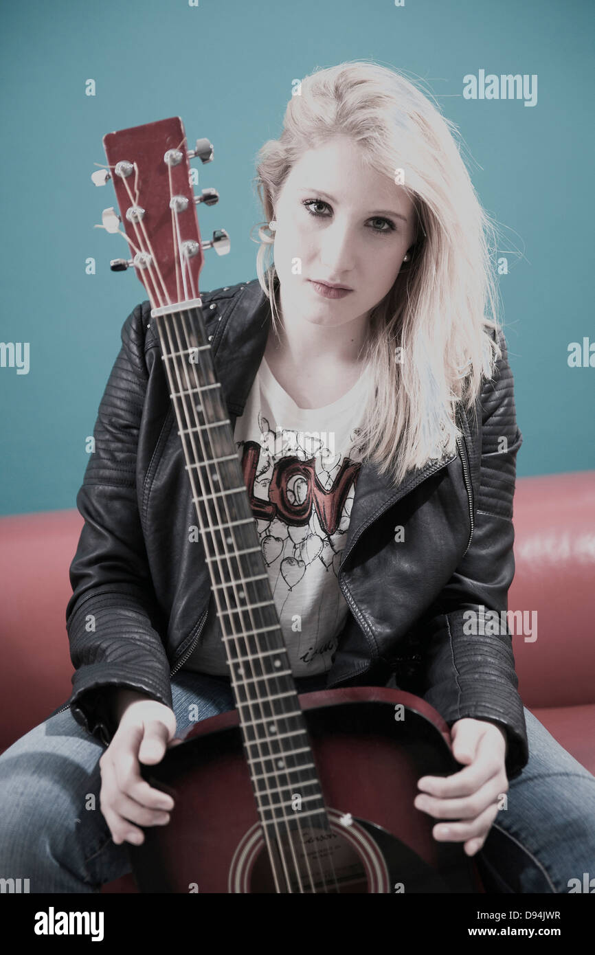 Woman guitar jeans hi-res stock photography and images - Alamy