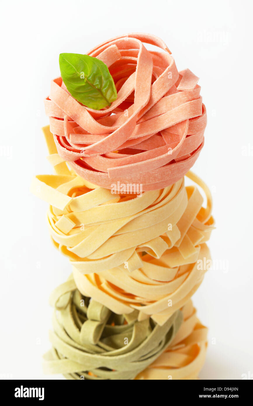 Bundles of dried ribbon pasta Stock Photo - Alamy