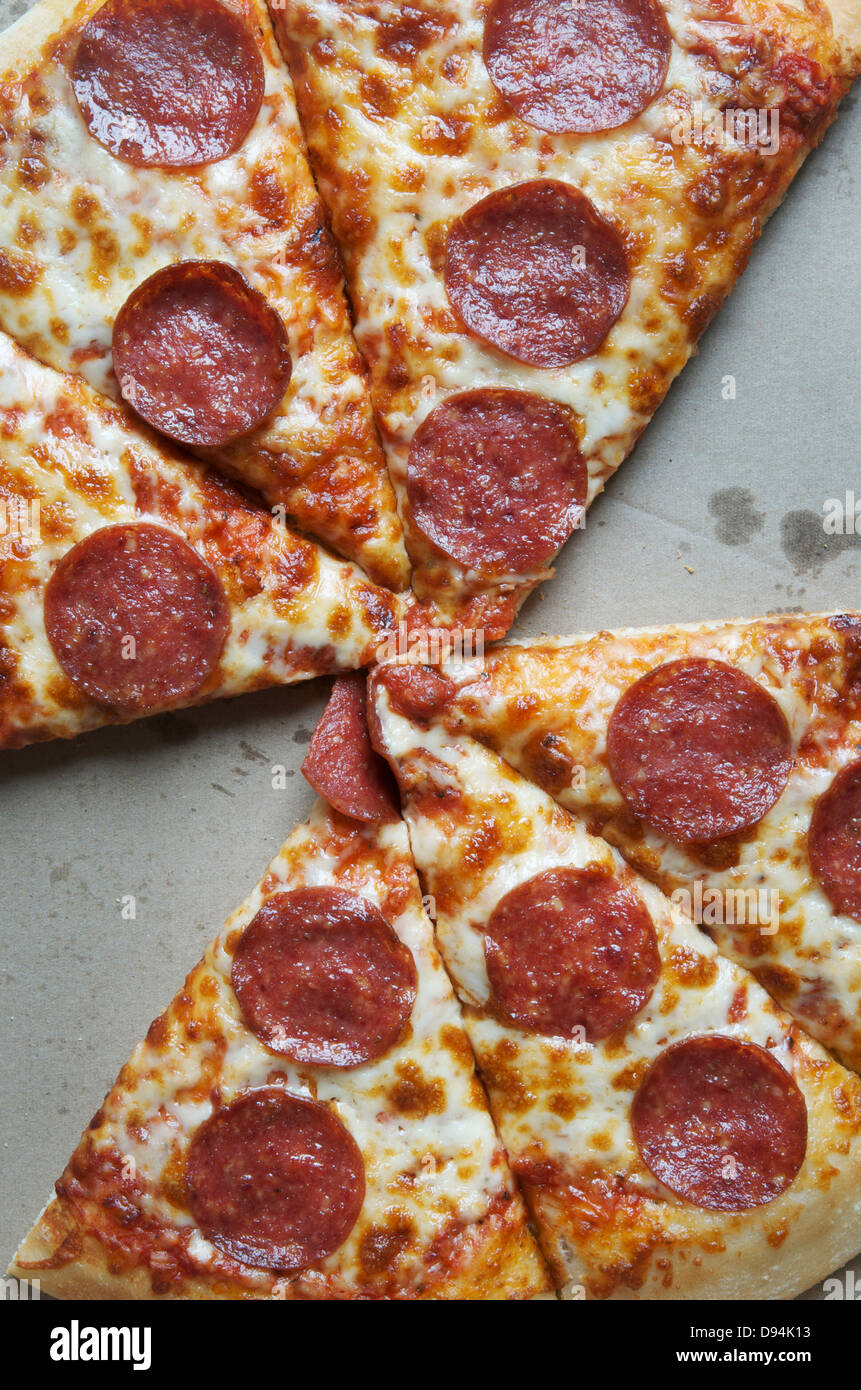 Overhead View of Sliced Pepperoni Pizza in Box Stock Photo - Alamy