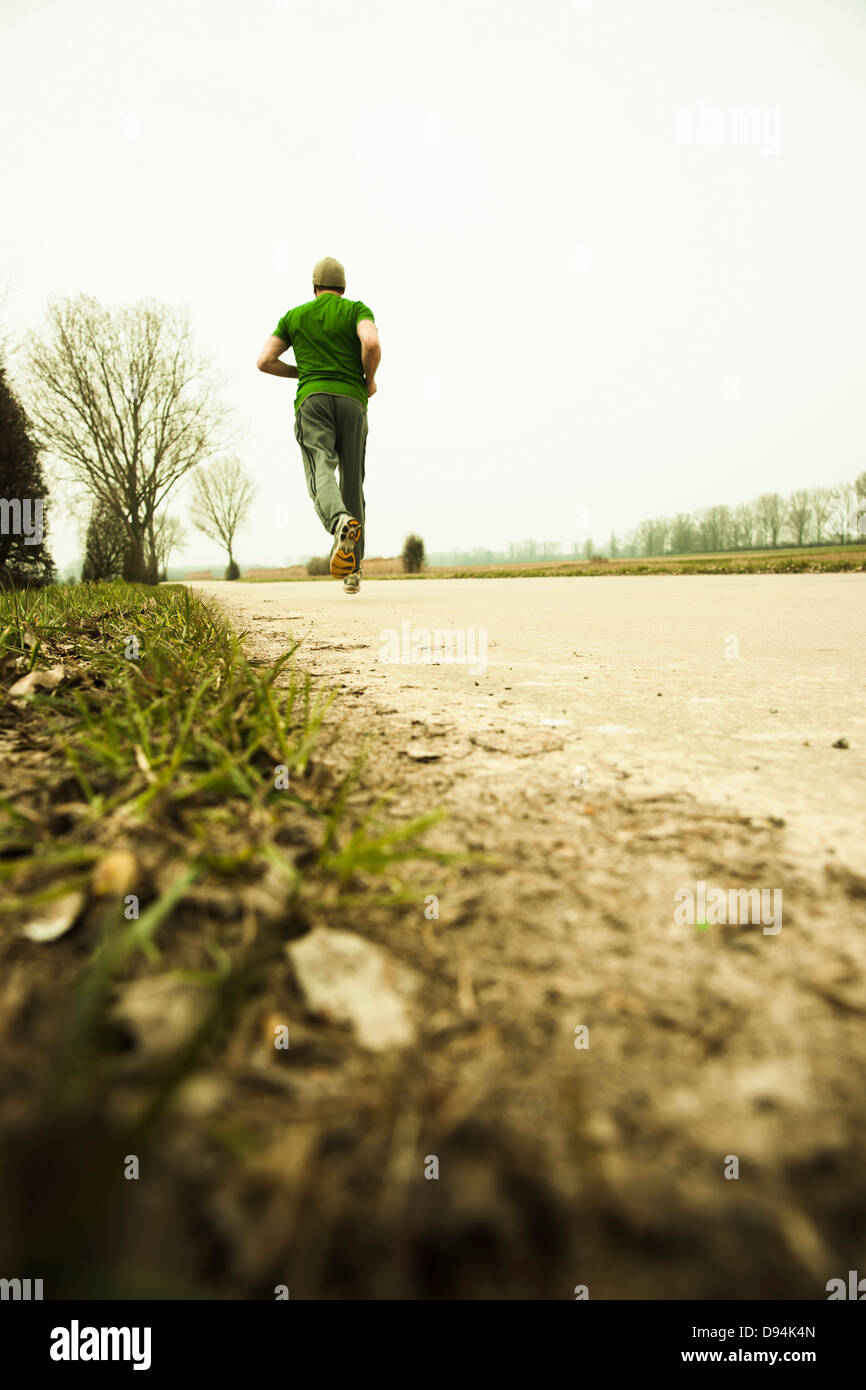 Man running back view one hi-res stock photography and images - Alamy