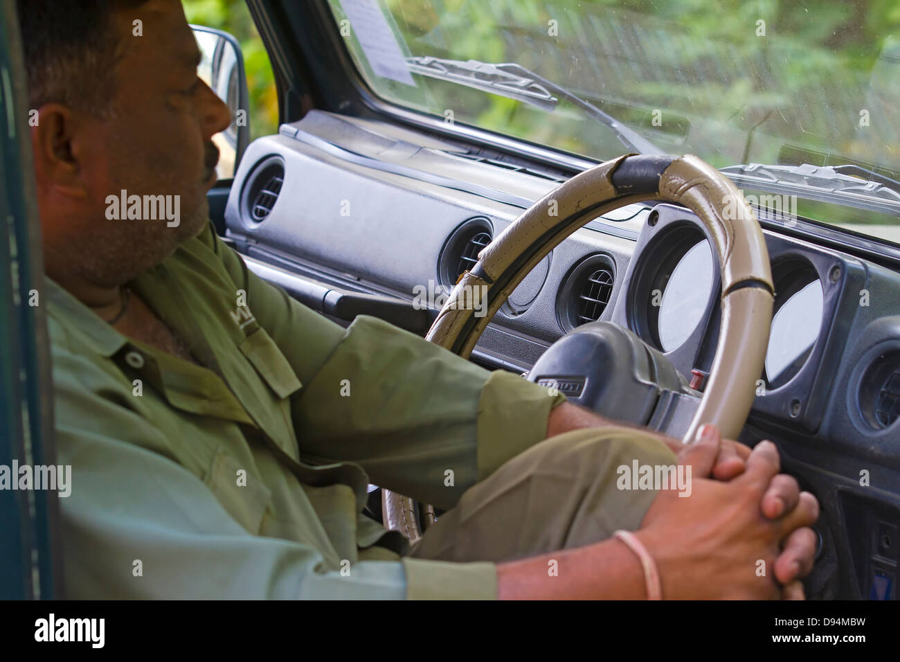 Driver relaxing in car Stock Photo - Alamy