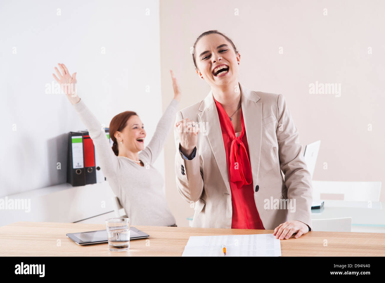 Women Cheering in Office Stock Photo - Alamy