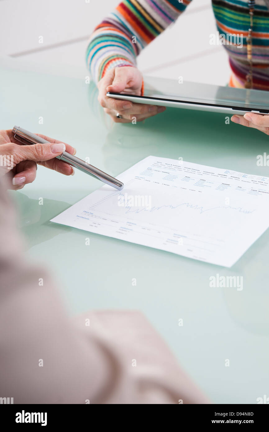 Close up woman working charts hi-res stock photography and images - Alamy