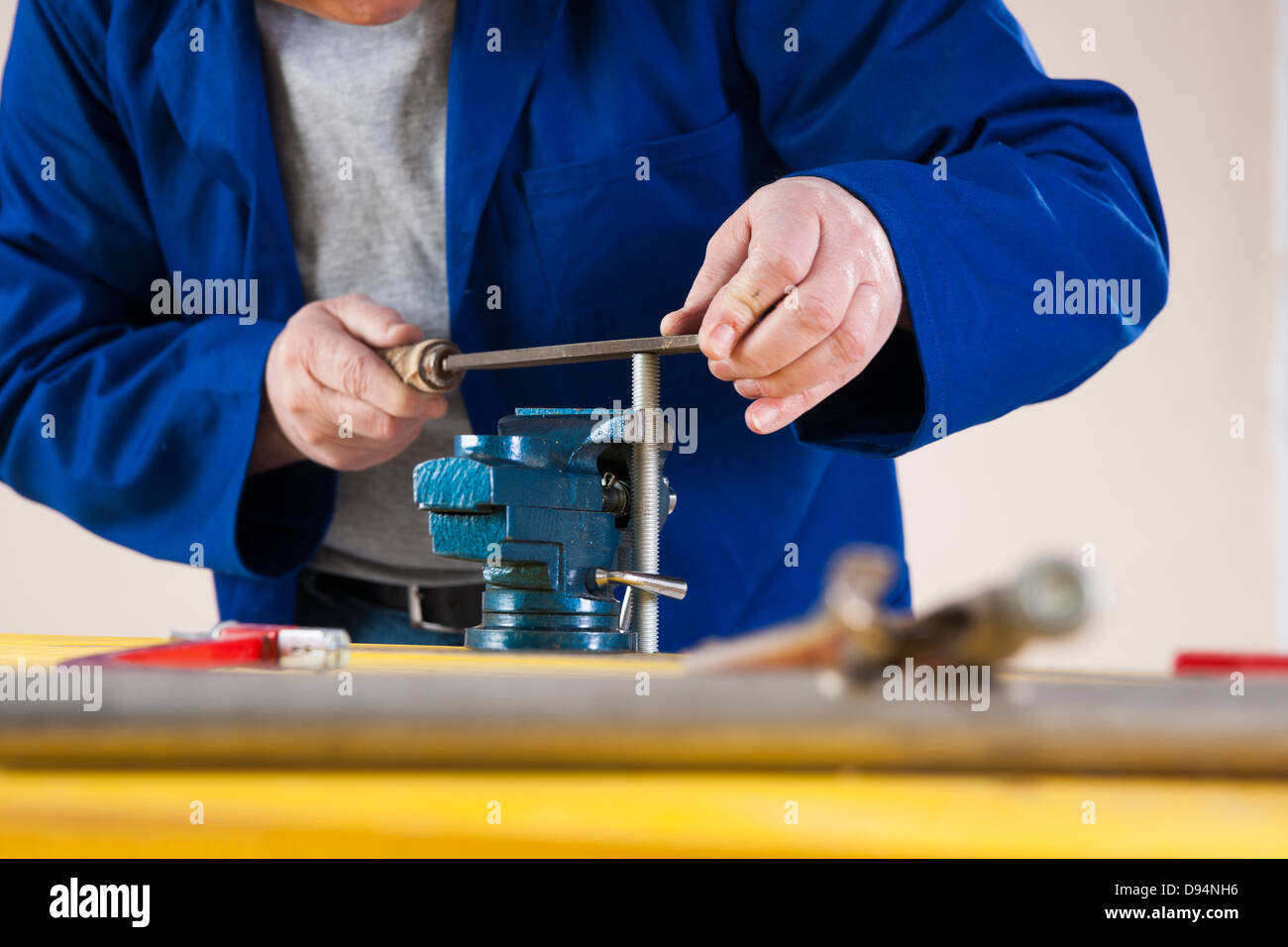 Man Filing a Pipe for a Plumbing Project, in Studio Stock Photo - Alamy