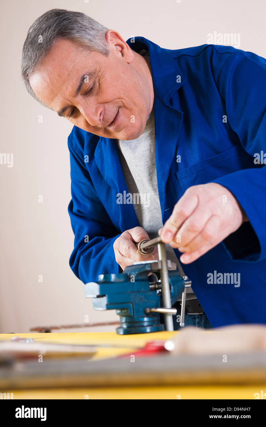 Man Filing a Pipe for a Plumbing Project, in Studio Stock Photo - Alamy
