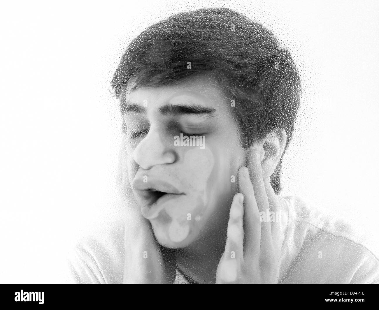 Face pressed against glass hi-res stock photography and images - Alamy