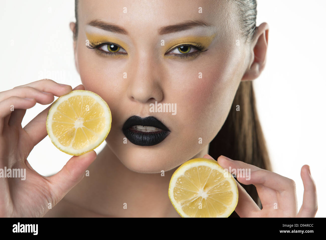 Beauty portrait of a girl with lemon on a white background Stock Photo ...