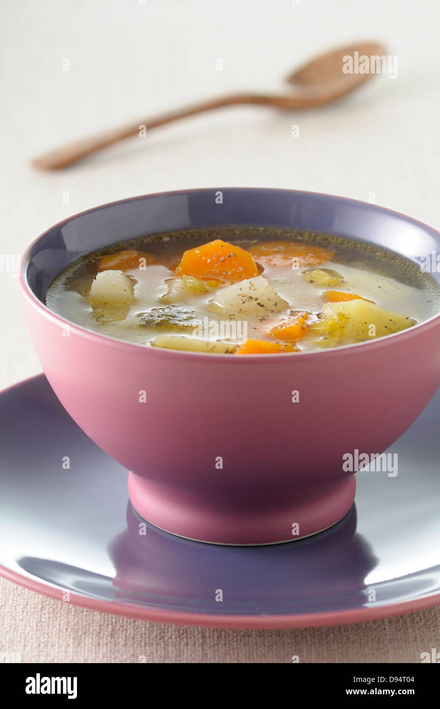 Close-up of Bowl of Vegetable Soup on Saucer, Studio Shot Stock Photo ...