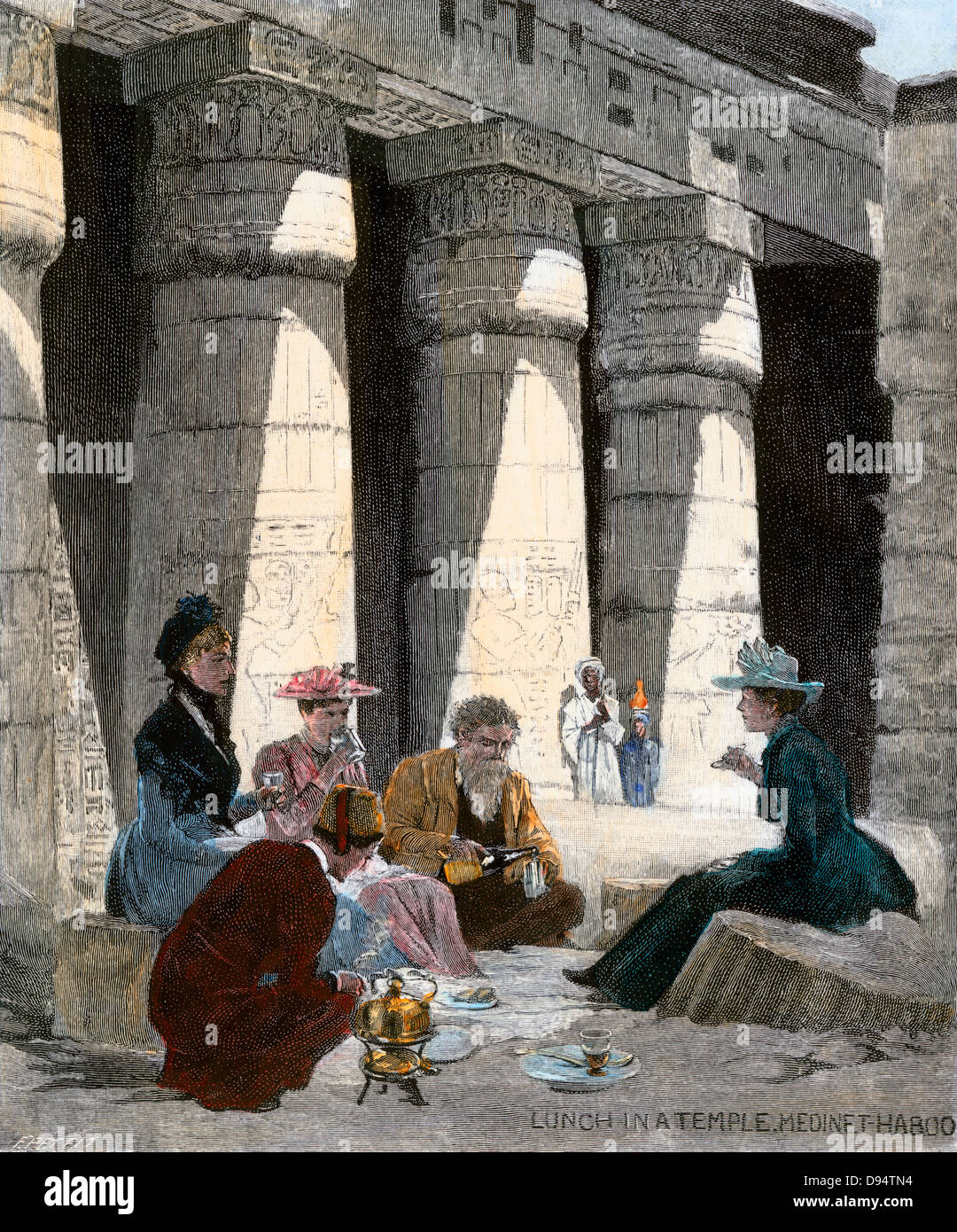 Tourists having lunch in the remains of an ancient Egyptian temple at ...