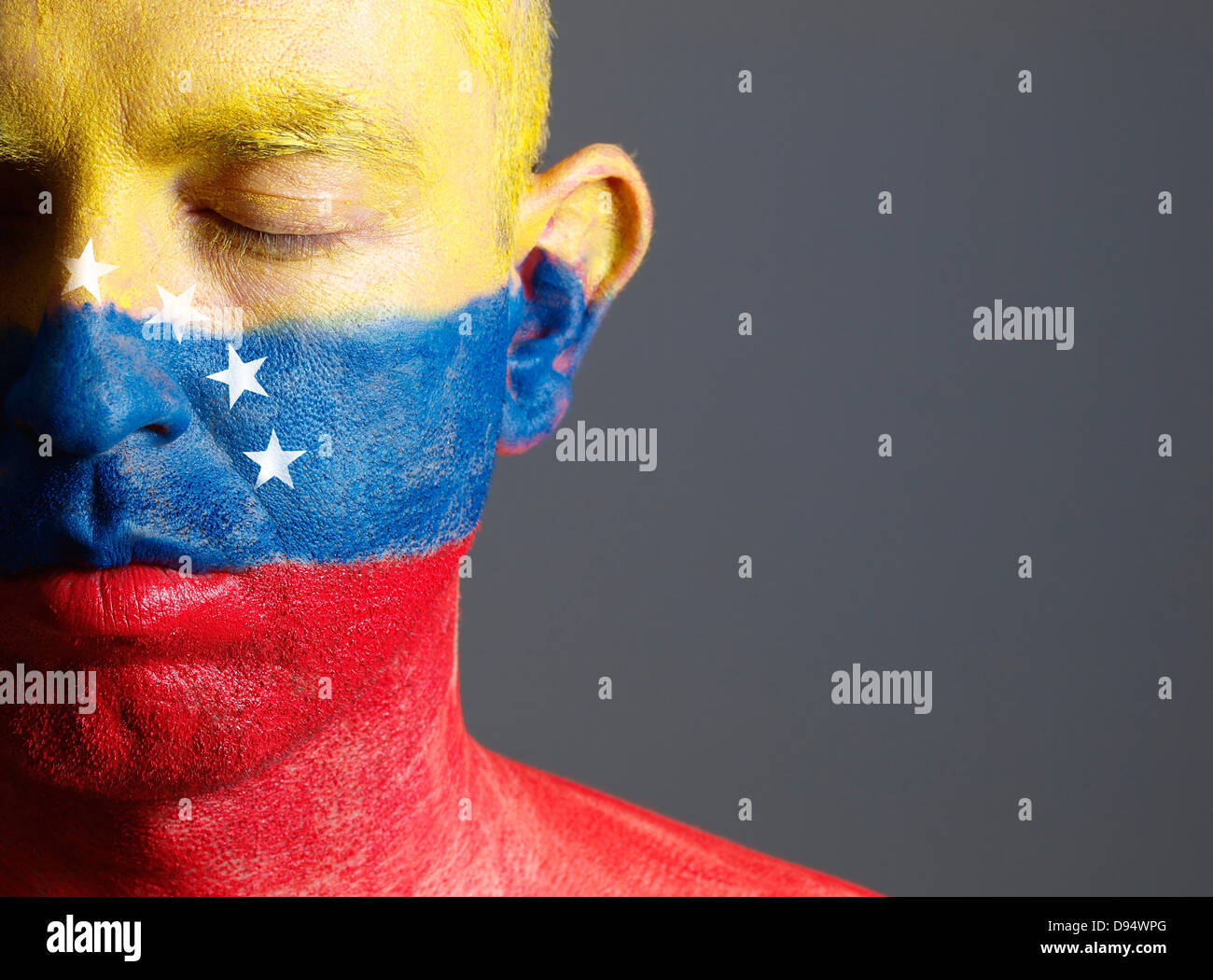 Man face painted venezuelan flag hi-res stock photography and images ...