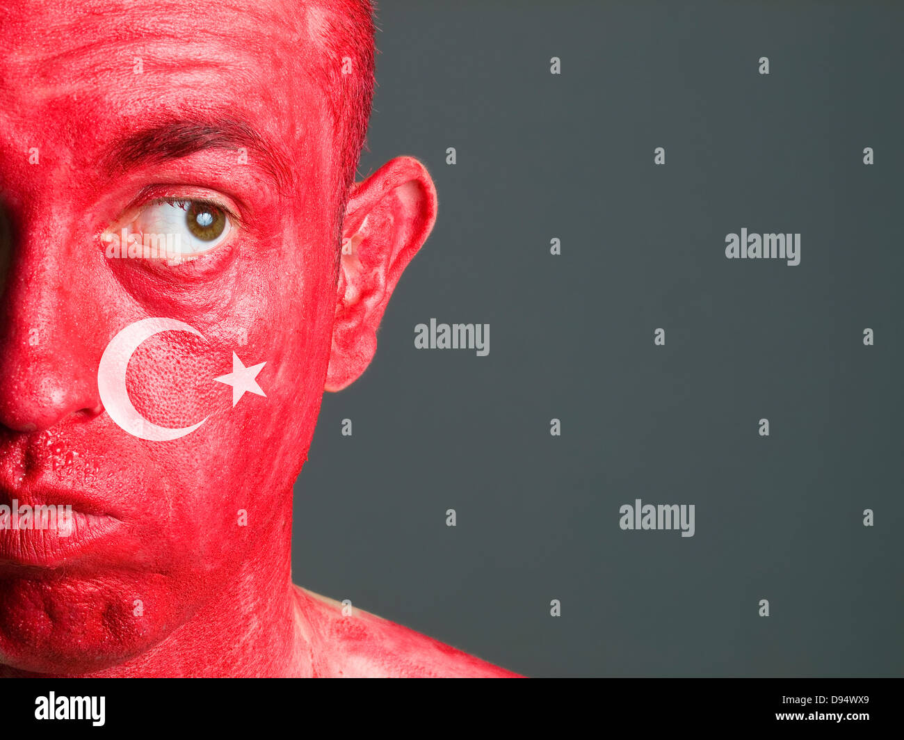 Face man makeup with turkish flag and isolated on dark background Stock ...