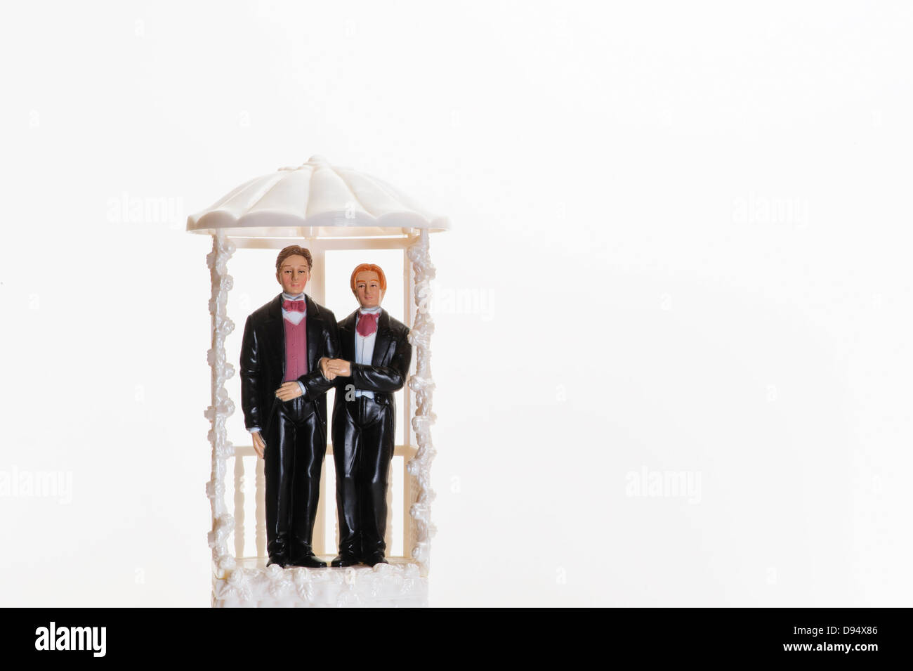 Male couple wedding cake topper Stock Photo - Alamy