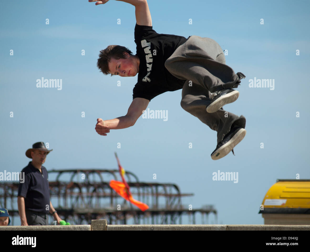 Practicing parkour on the seafront in Brighton Stock Photo - Alamy