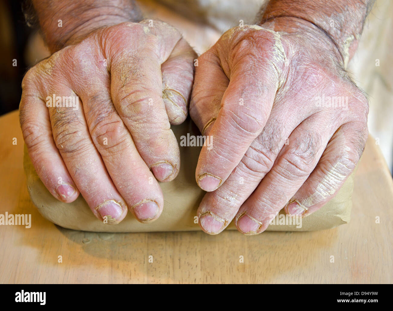 The potter hands Stock Photo - Alamy