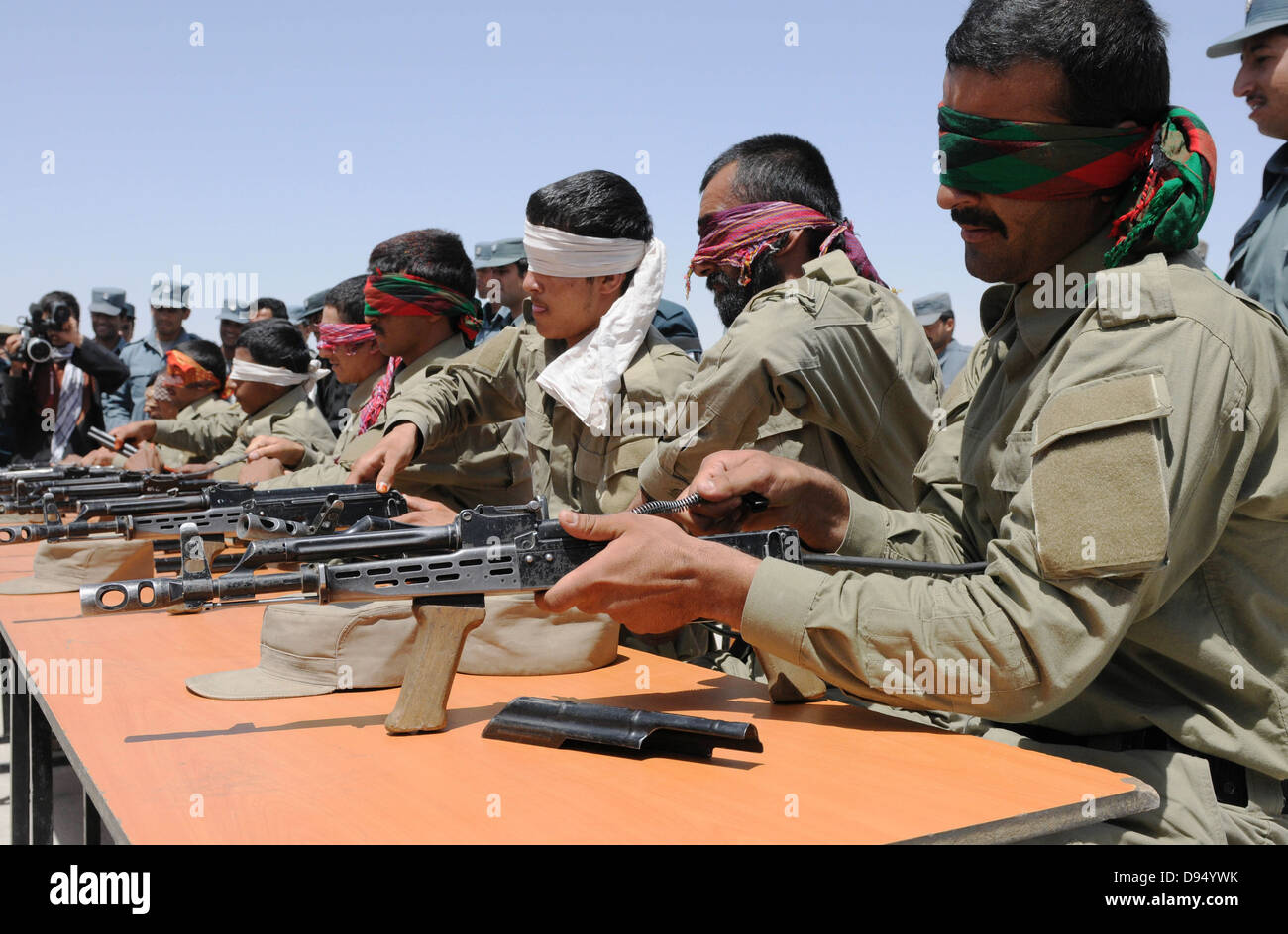 Afghan Local Police recruits officers demonstrate their knowledge of AK ...