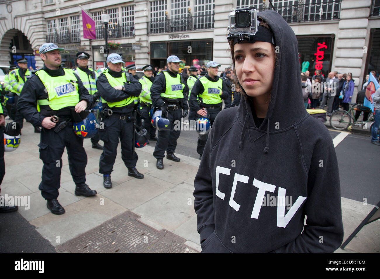 Protester with a CCTV camera strapped to her head to film police during ...