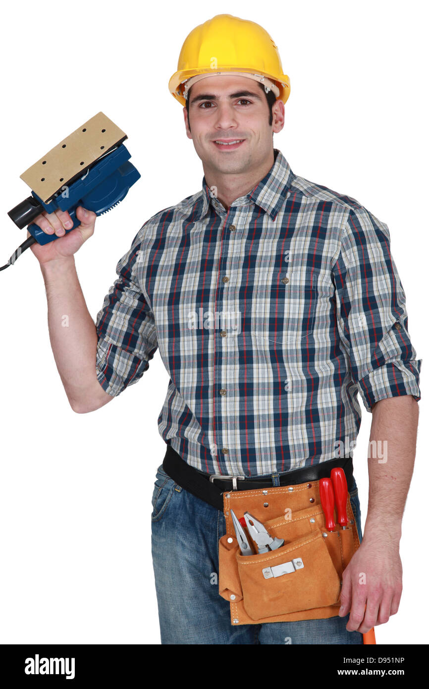 Man with an electric sander Stock Photo - Alamy