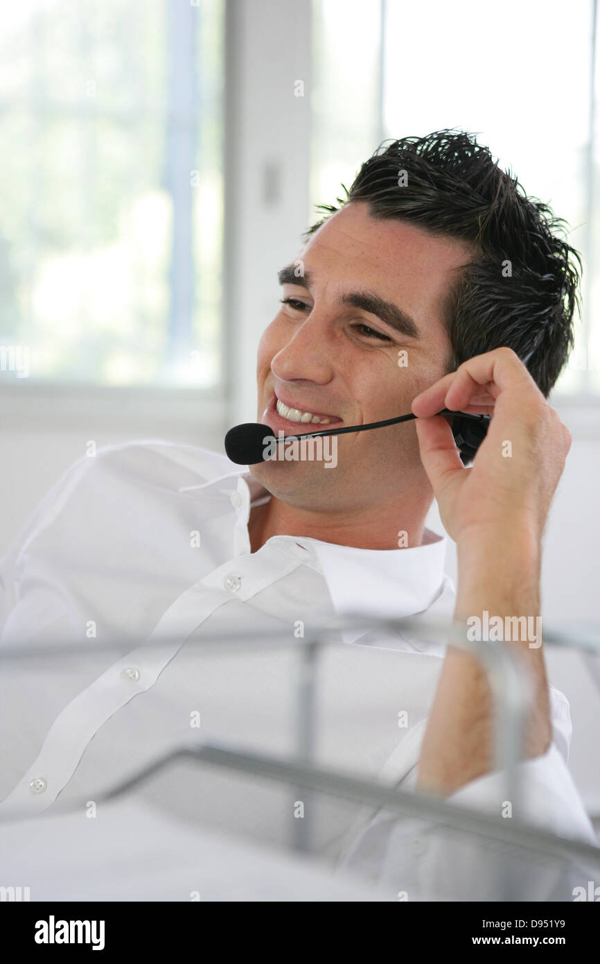 Man wearing a headset Stock Photo - Alamy